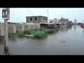 CLEAN: Residents of Sujawal chest-deep in flood waters 1st - 2nd Grade ...